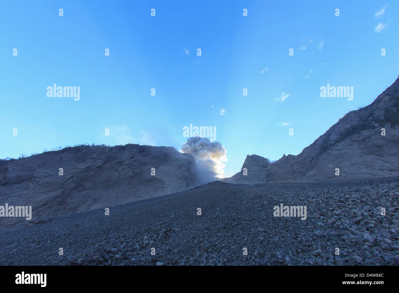 Steam erupting from rock formation Stock Photo - Alamy