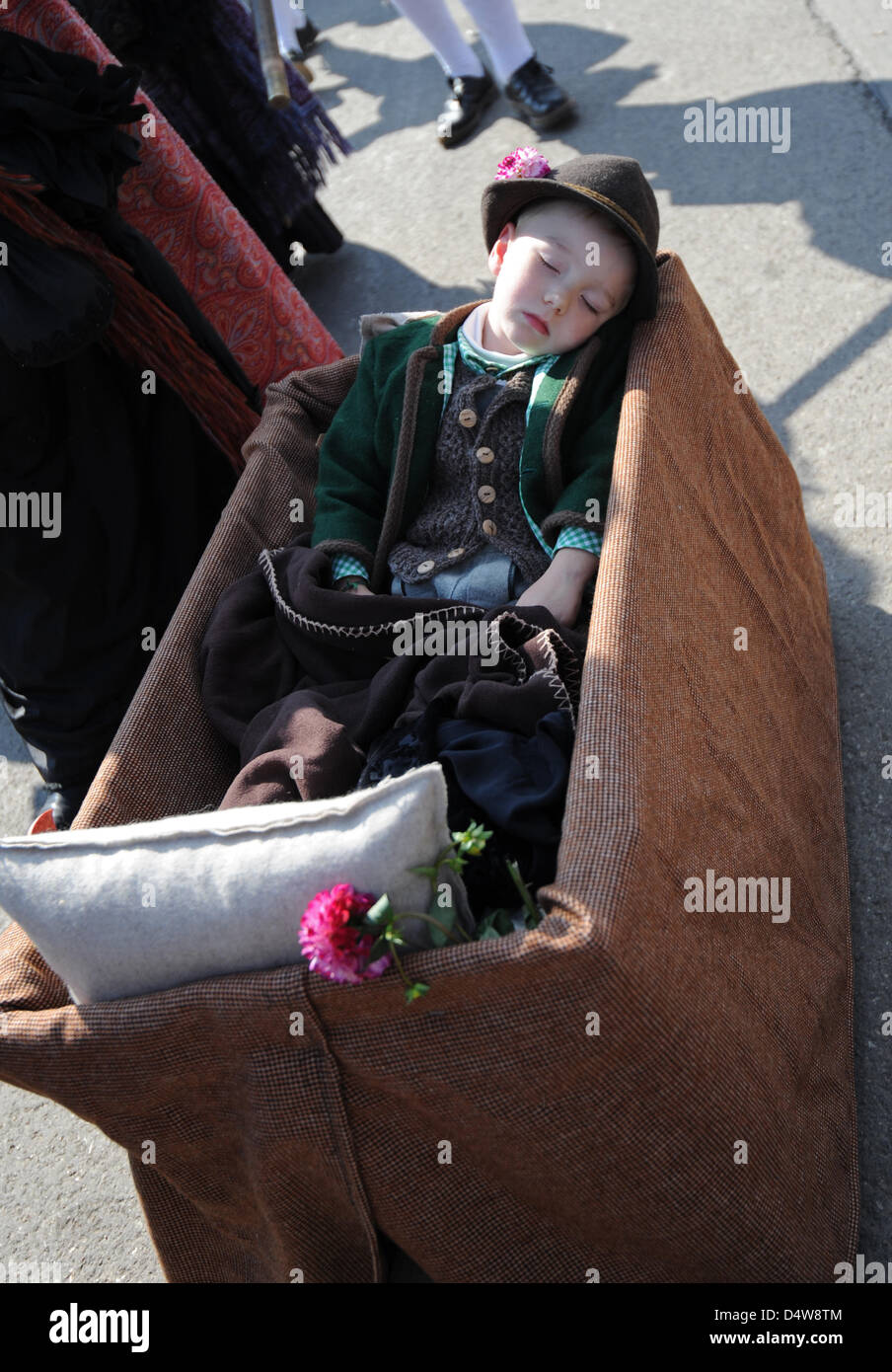 A child wears traditional costume at the traditional costume and ...