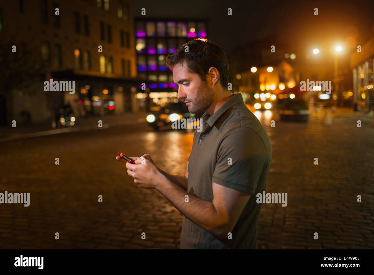 Adult male dark mobile phone side view hi-res stock photography and ...
