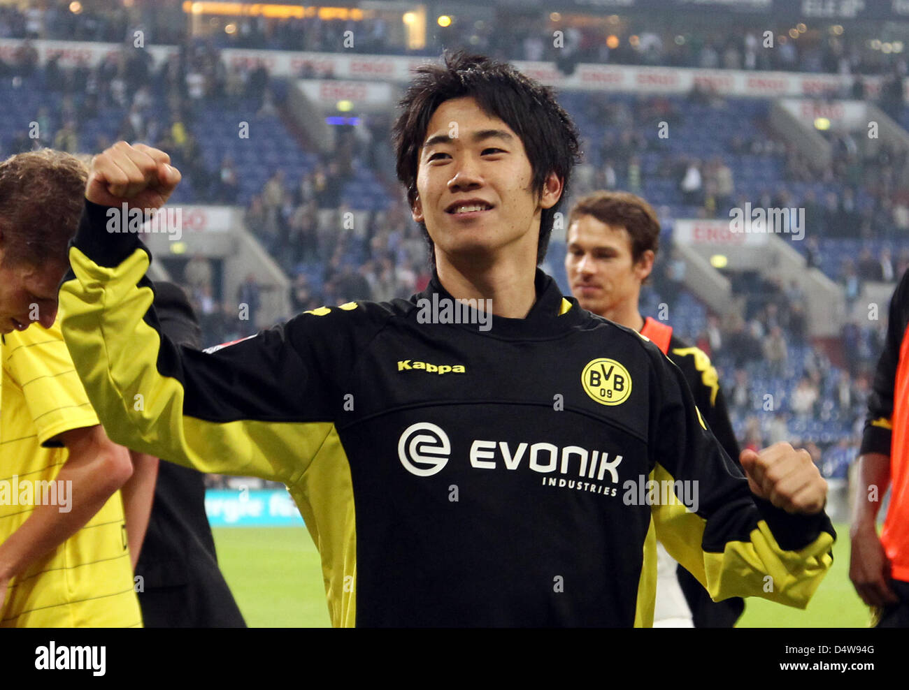 Dortmund's Shinji Kagawa celebrates his two goals after the end of the ...
