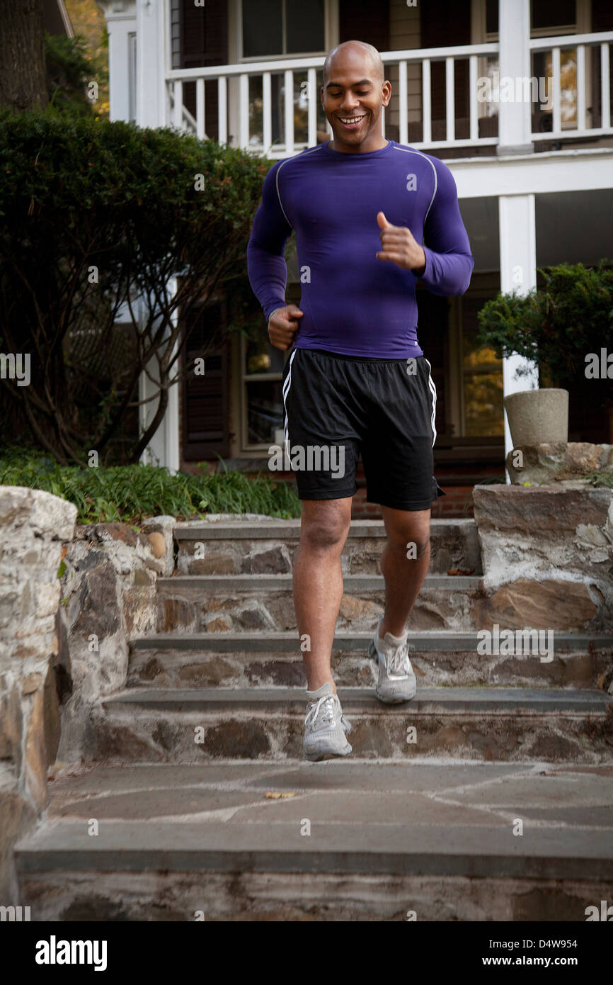 Healthy man running steps hi-res stock photography and images - Alamy
