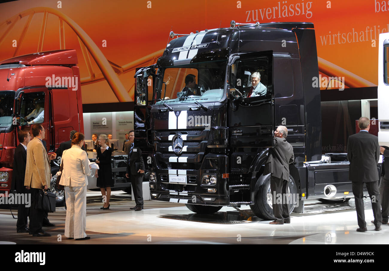 Visitors eye truck of Mercedes-Benz at the IAA Commercial Vehicles in ...