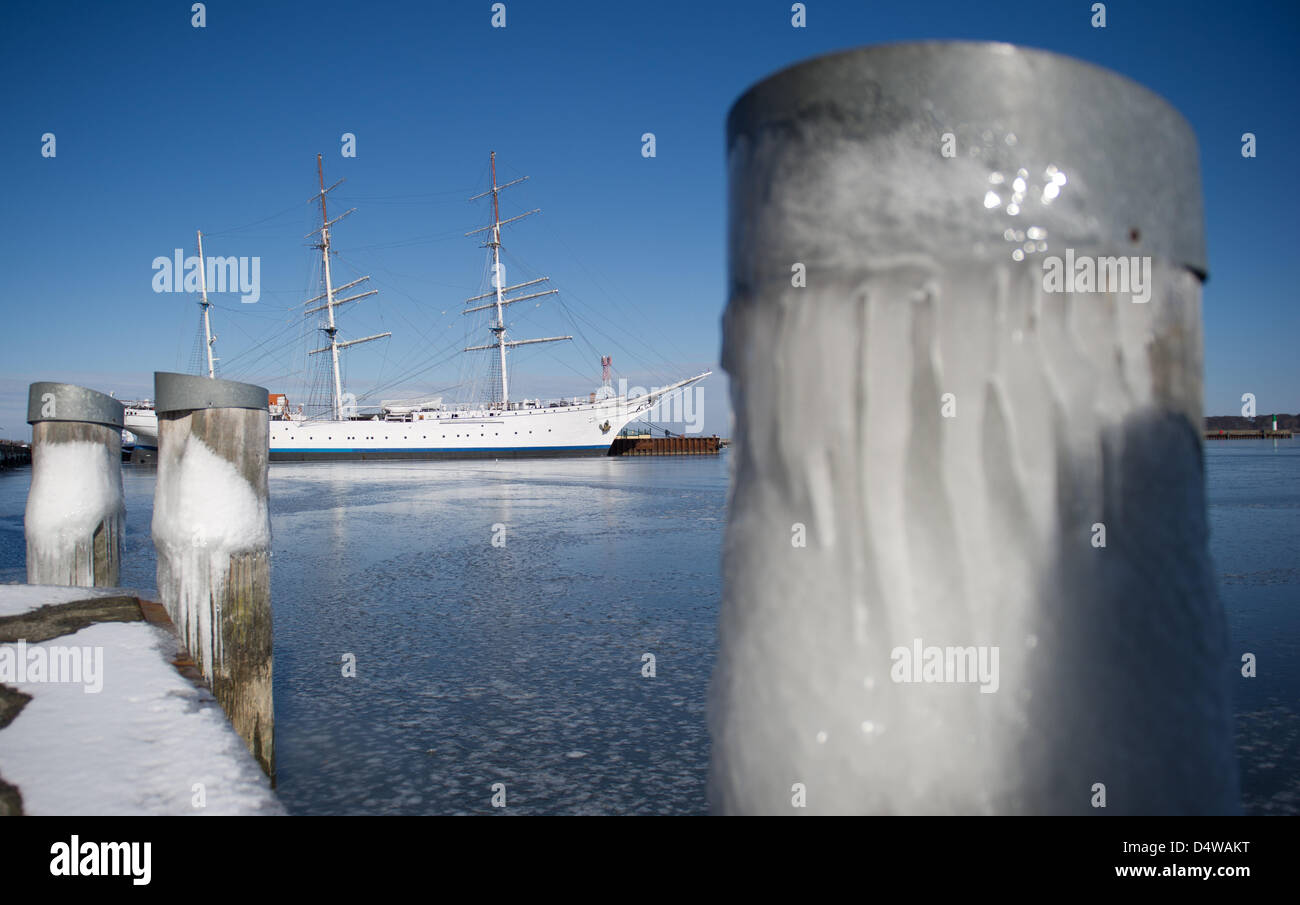 Thick icicles are pictured at a bollard on front of the sailing ship ...