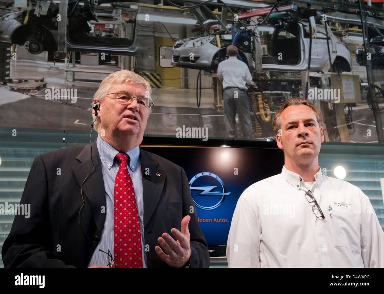 Nick Reilly (L), President of General Motors Europe, talks during a ...