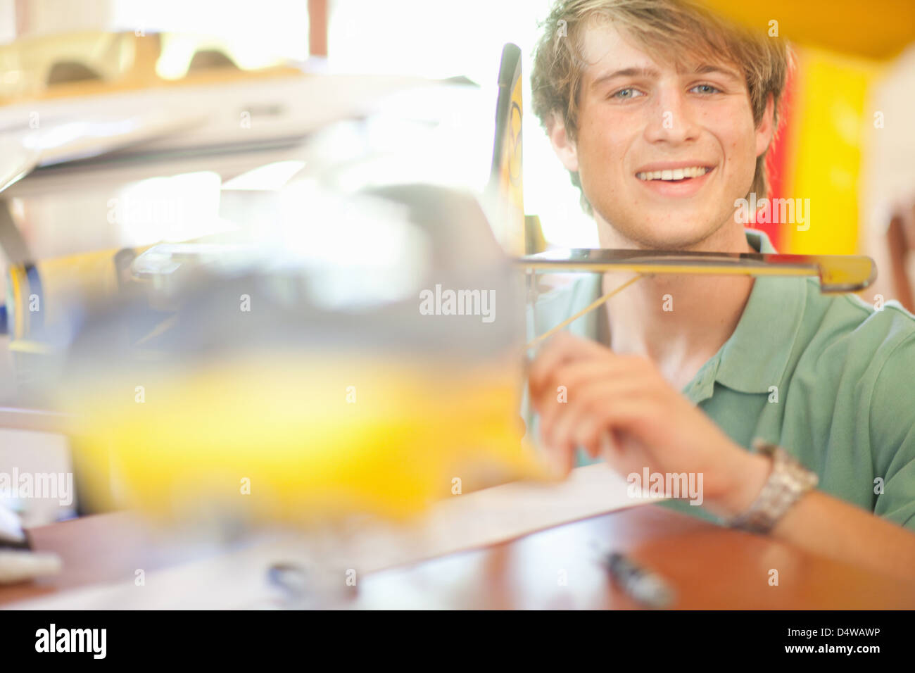 Man working on model airplane Stock Photo - Alamy