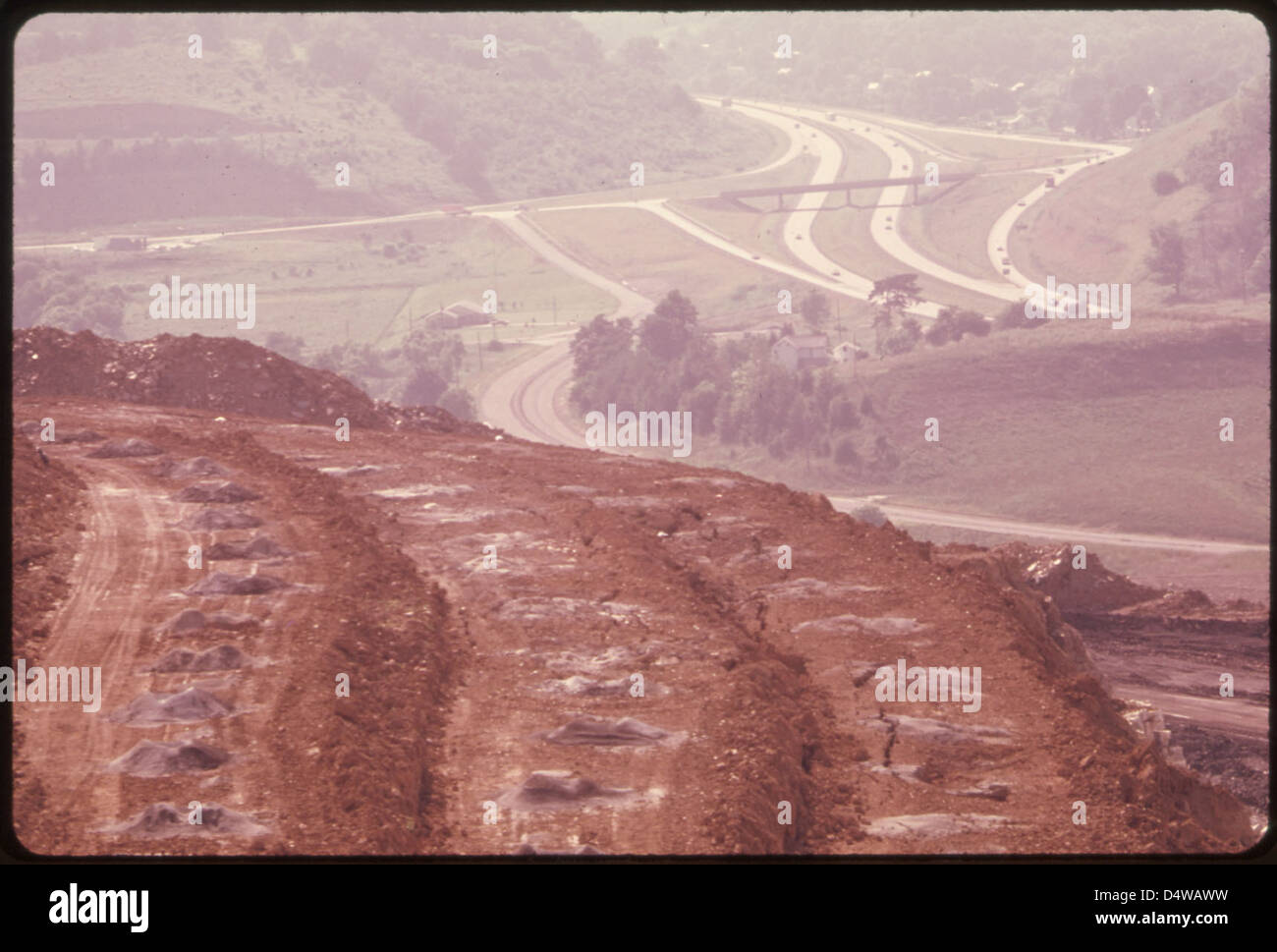 A photograph from July 1974 shows a strip mining operation near ...