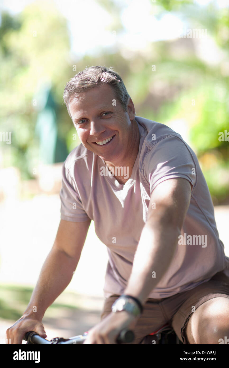 Man riding bike hi-res stock photography and images - Alamy