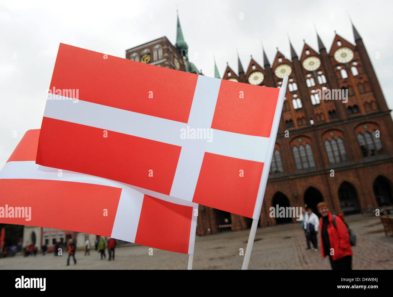 Danish flags pictured in front of the city hall of Stralsund, Germany ...