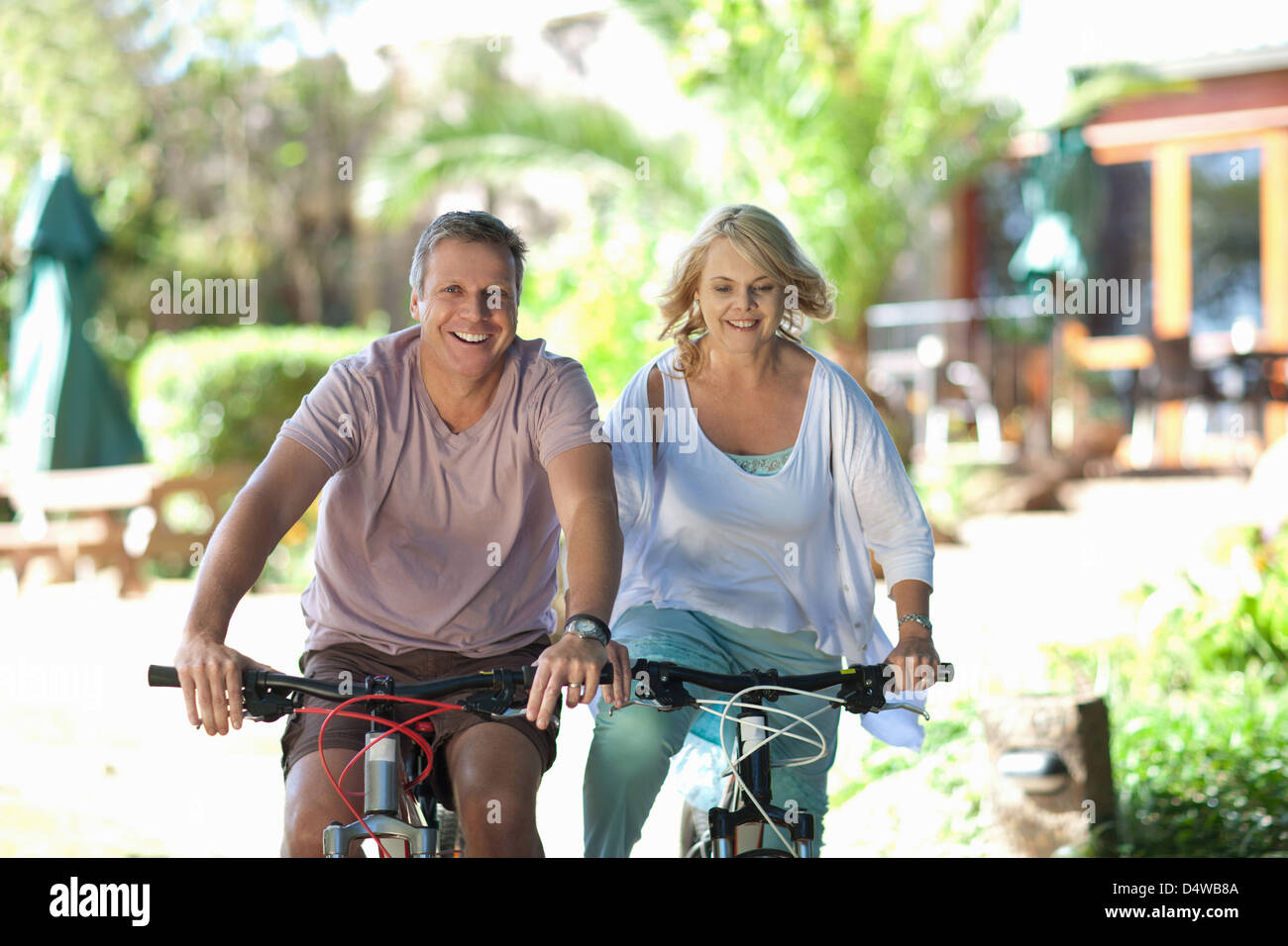 Wife husband riding bikes hi-res stock photography and images - Alamy