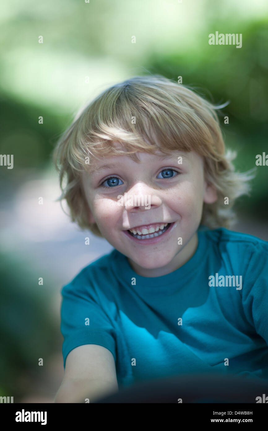 Close up of boy's smiling face Stock Photo - Alamy