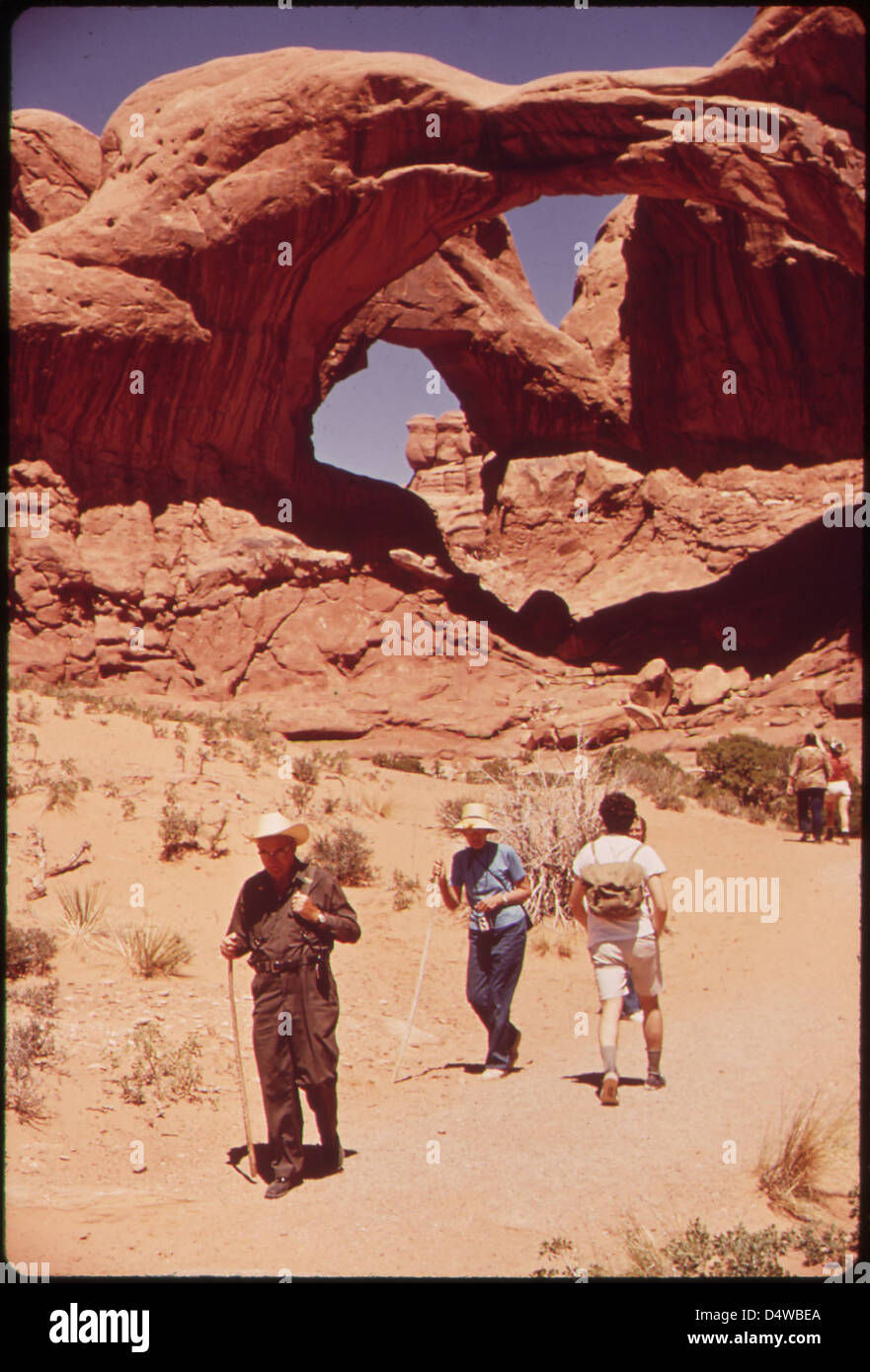 A photograph from May 1972 captures the Double Arch in the Windows ...