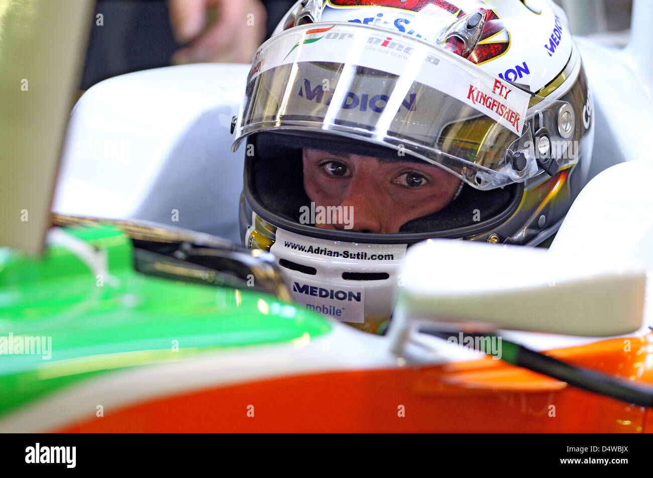 German Adrian Sutil of Force India sits in his race car during the ...