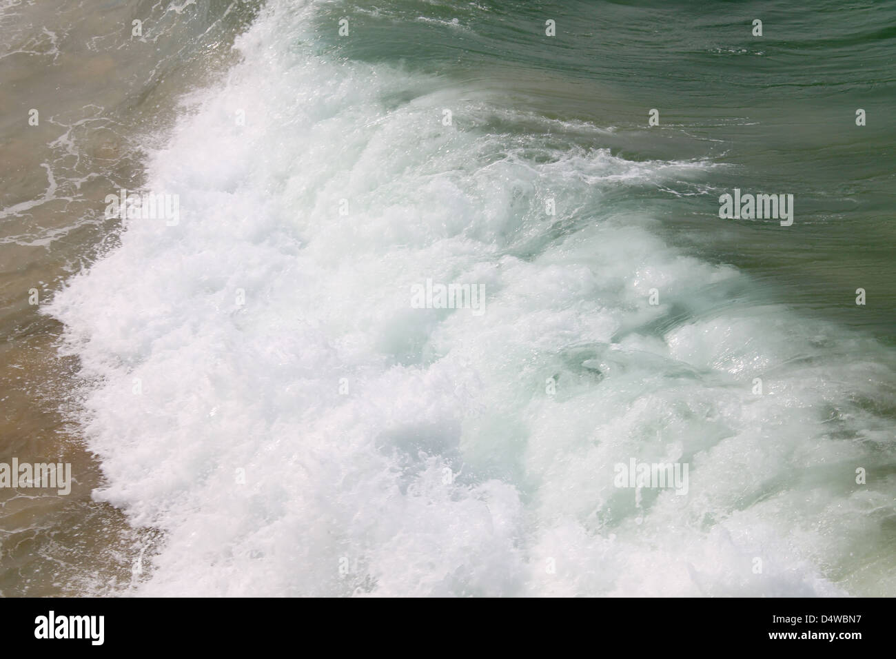 Tide after a wave Stock Photo - Alamy