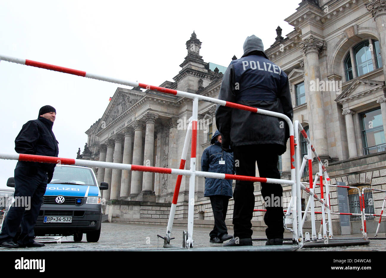 Police officers guard the Reichstag building in Berlin, Germany, 22 ...
