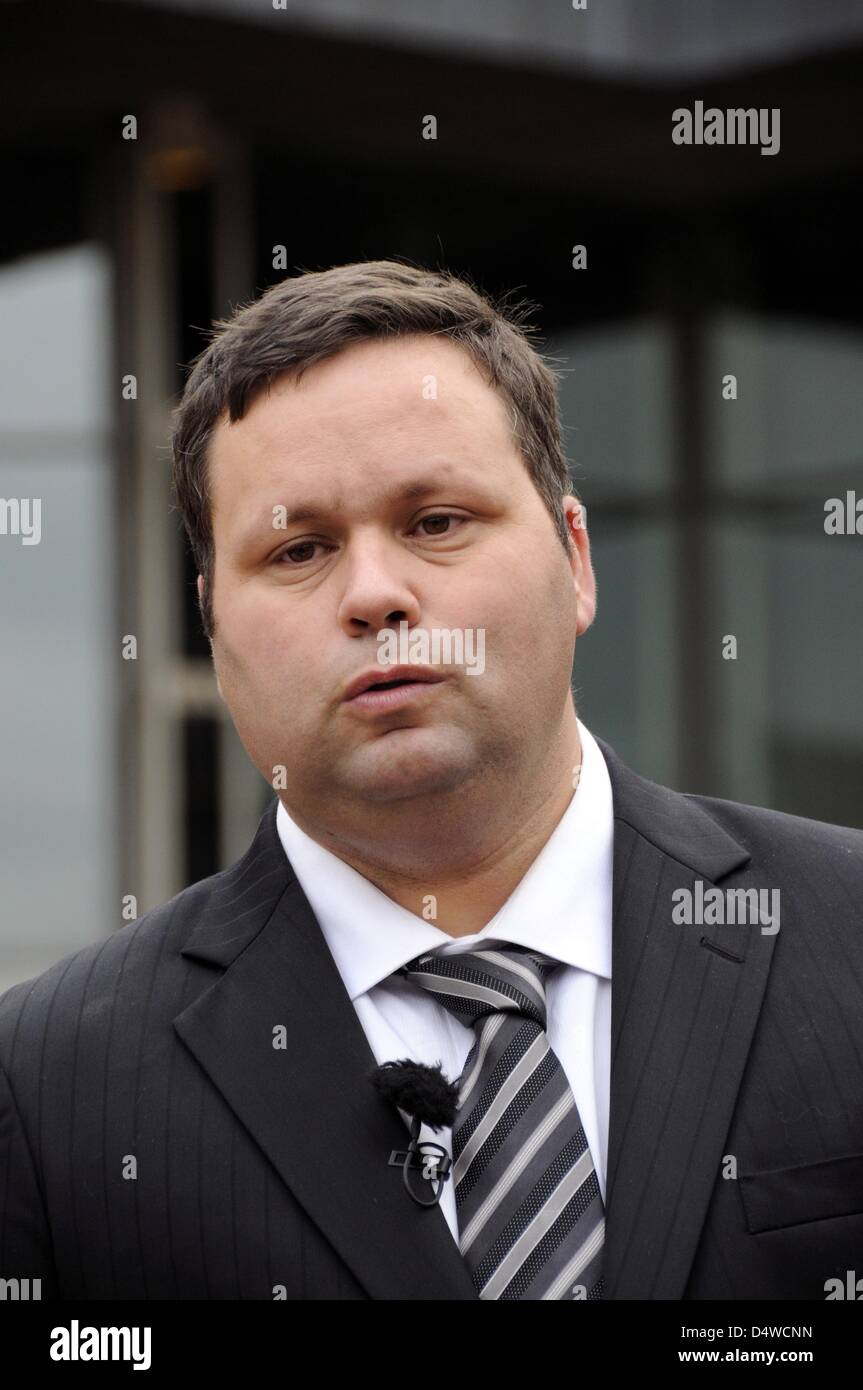 British tenor Paul Potts poses in the course of a charity event that is ...