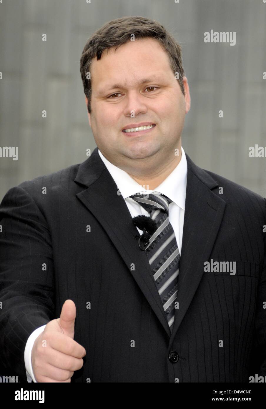 British tenor Paul Potts poses in the course of a charity event that is ...