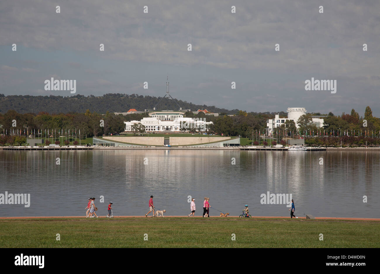 Provisional Parliament House and Capital Hill over Lake Burley Griffin on a sunny Autumn Day ...