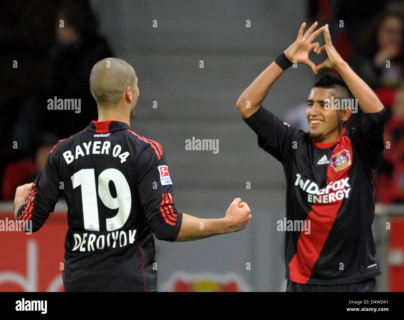 Leverkusen's Arturo Vidal (R) celebrates his 1-1 during German ...