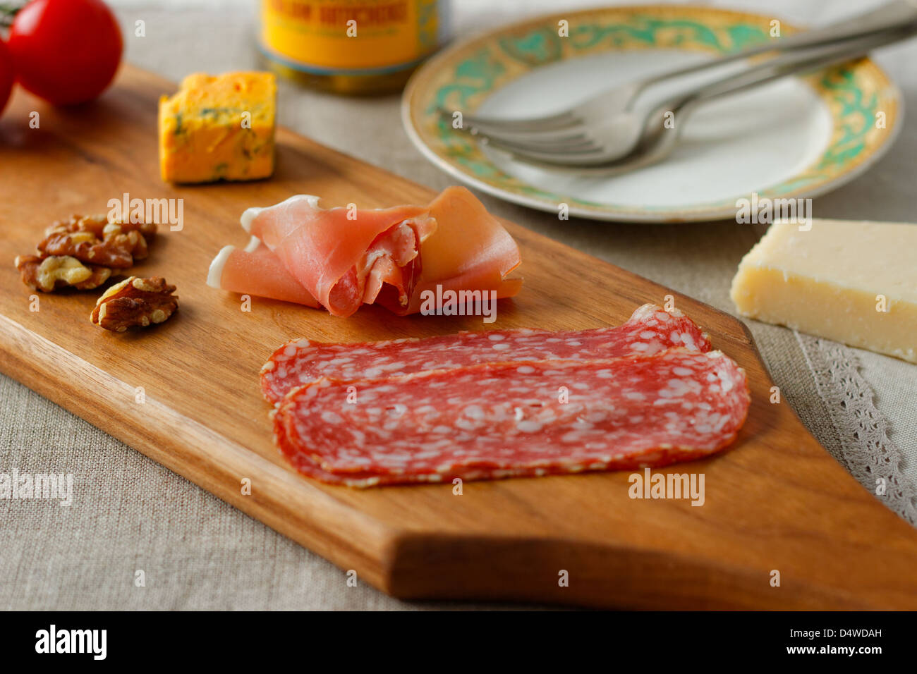 Selection board of salami and Cheese antipasti on a board Stock Photo ...