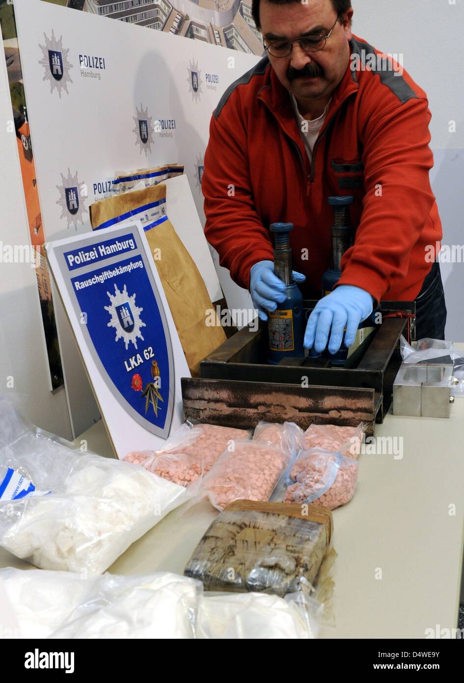 A police officer presents seized drugs at the police headquarters in ...