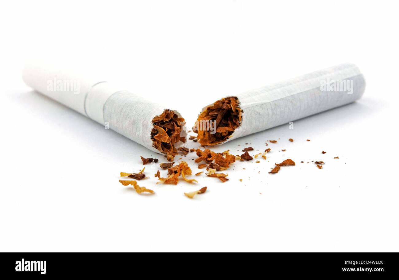 Broken cigarette on white Stock Photo - Alamy