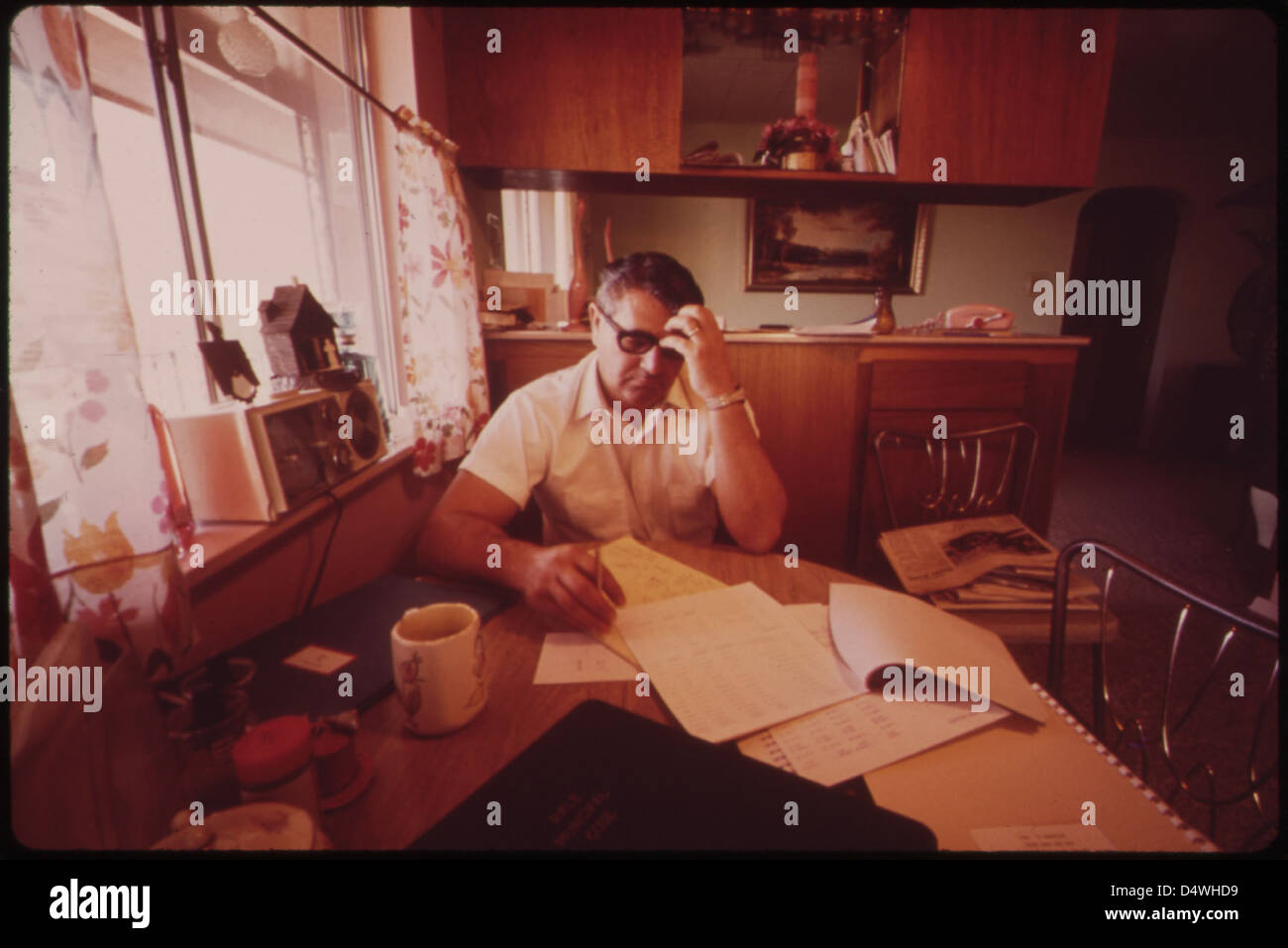 In October 1972, Mayor John Scalzo works on the Rifle City budget at ...