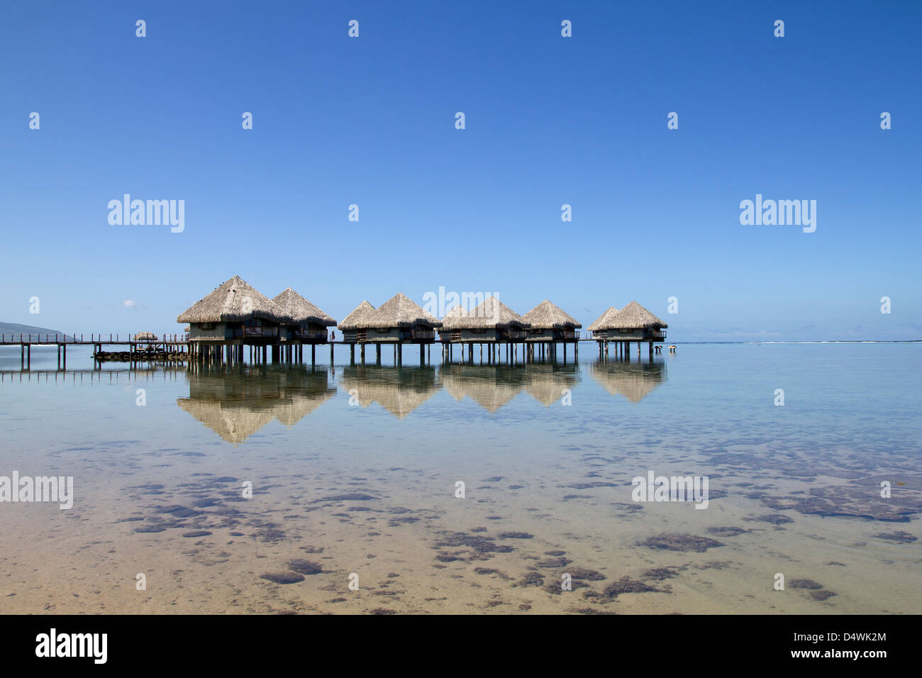 Tropical lagoon overwater bungalows hi-res stock photography and images ...