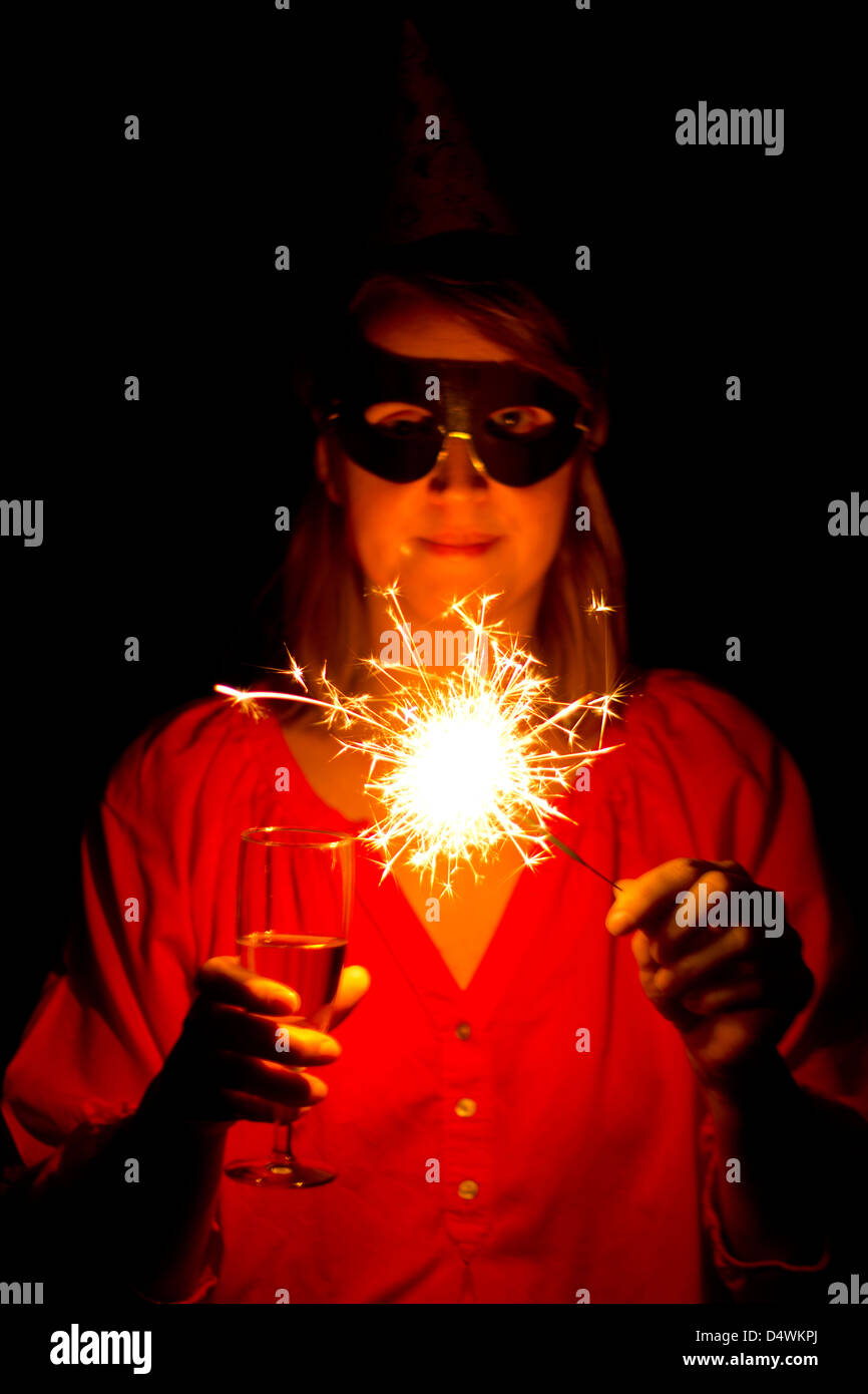 Woman with sparkler Stock Photo - Alamy