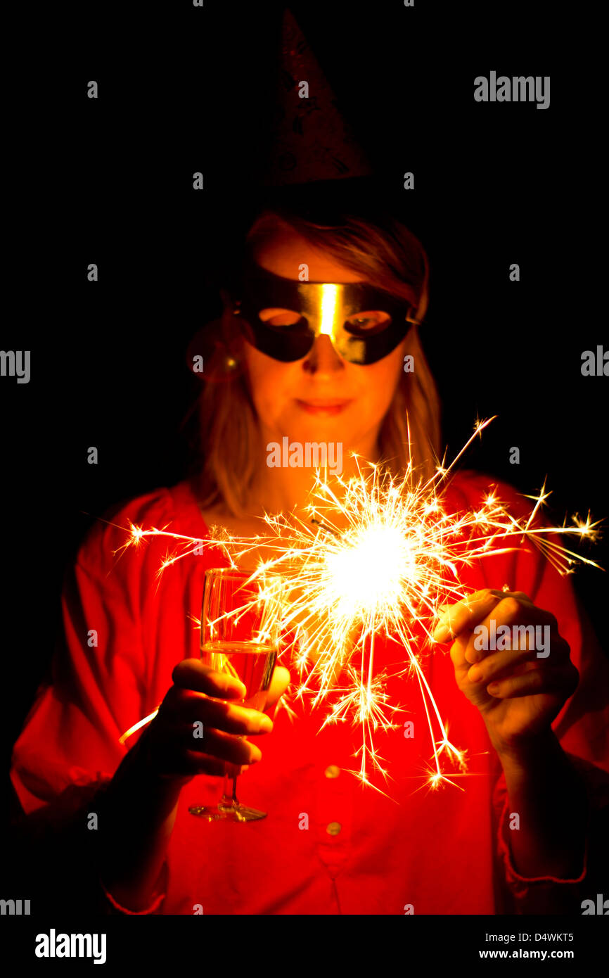 Woman with sparkler Stock Photo - Alamy
