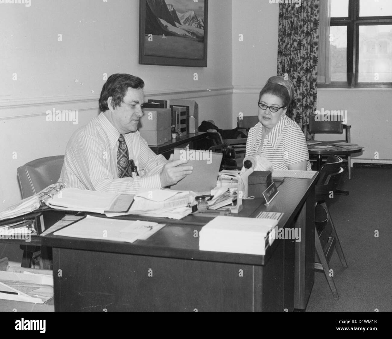 William Lind is seen assisting a researcher in this 1972 photograph ...