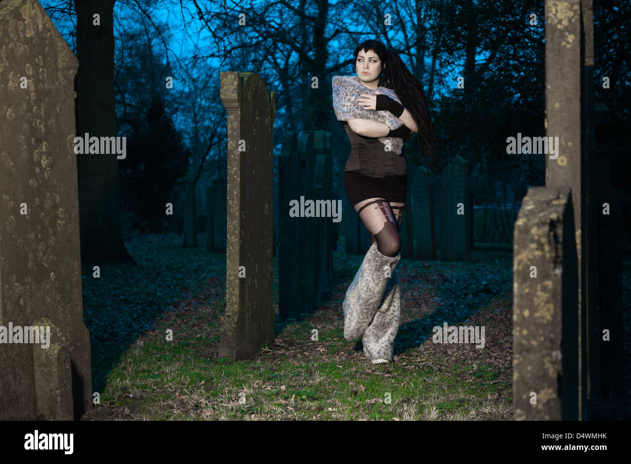 Gothic girl on cemetery Stock Photo - Alamy