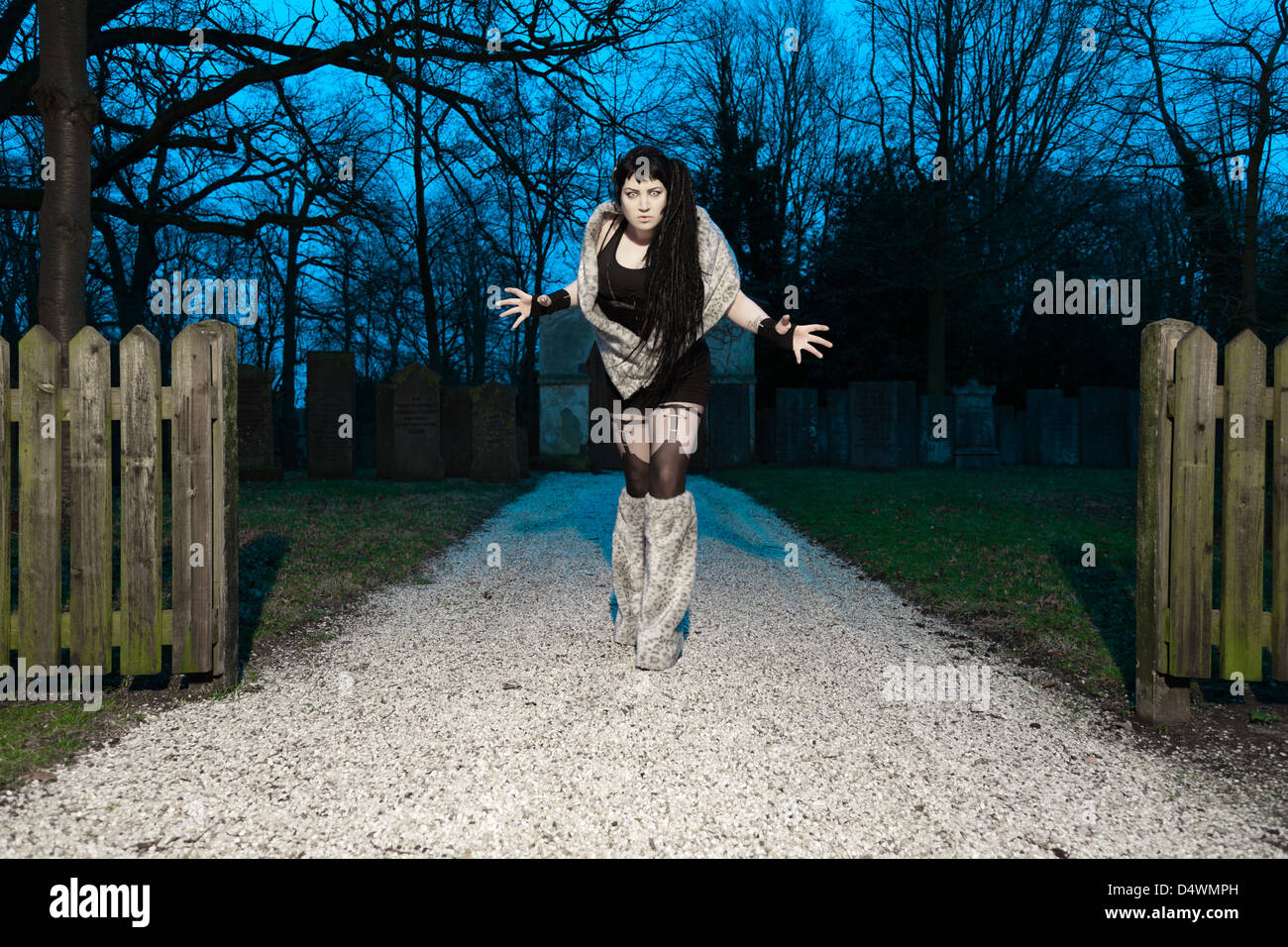 Gothic girl on cemetery Stock Photo - Alamy