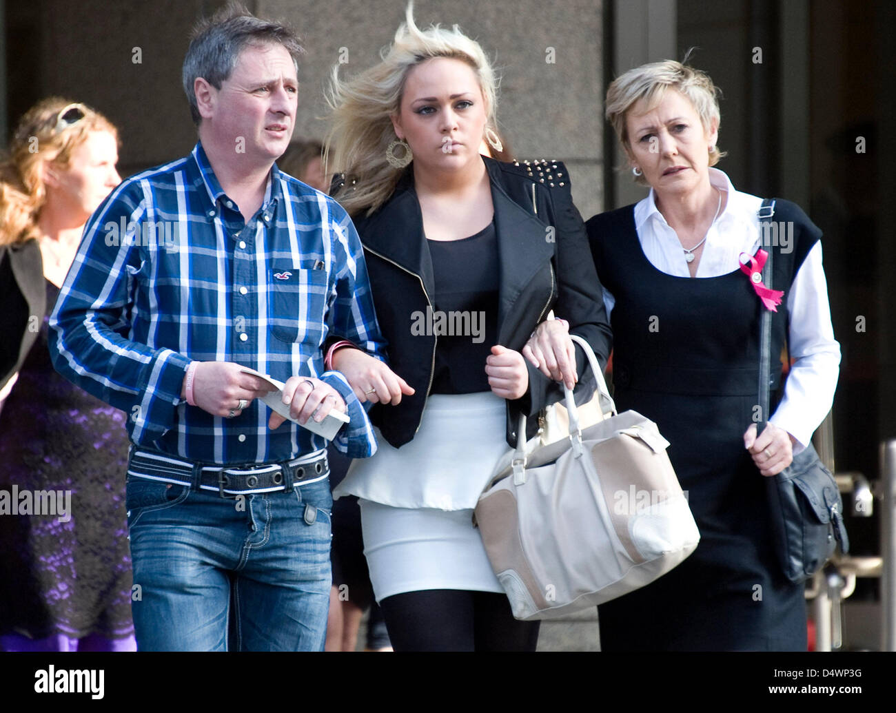 Tokyo, Japan. 19th March 2013. Andrew, Andrea and Angela Furlong leave ...
