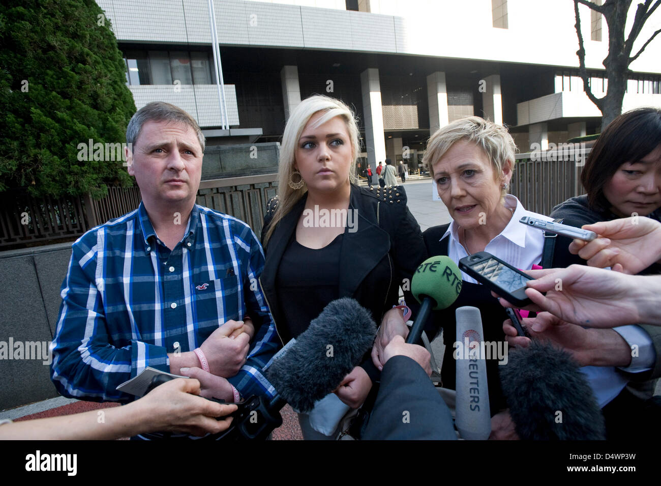 Tokyo, Japan. 19th March 2013. Andrew and Angela Furlong leave the ...