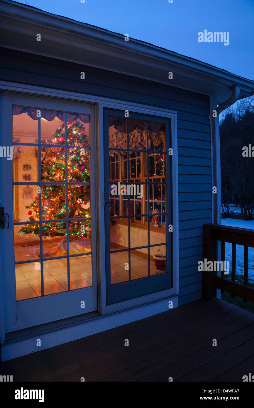 Christmas Tree Viewed through Window of Residential Home, USA Stock ...
