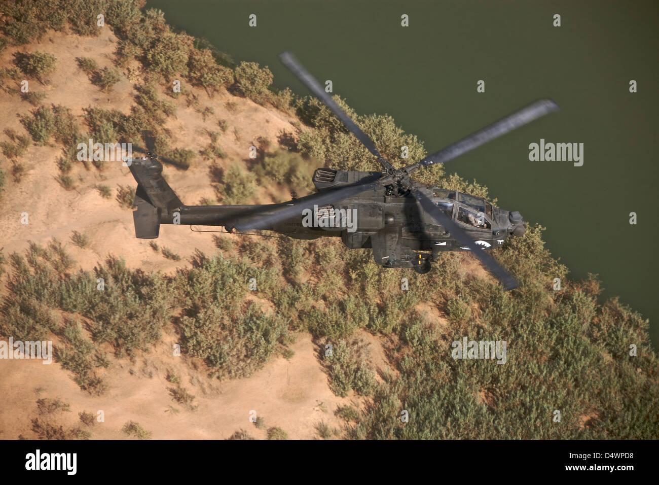 An AH-64D Apache Longbow helicopter in flight over Northern Iraq Stock ...