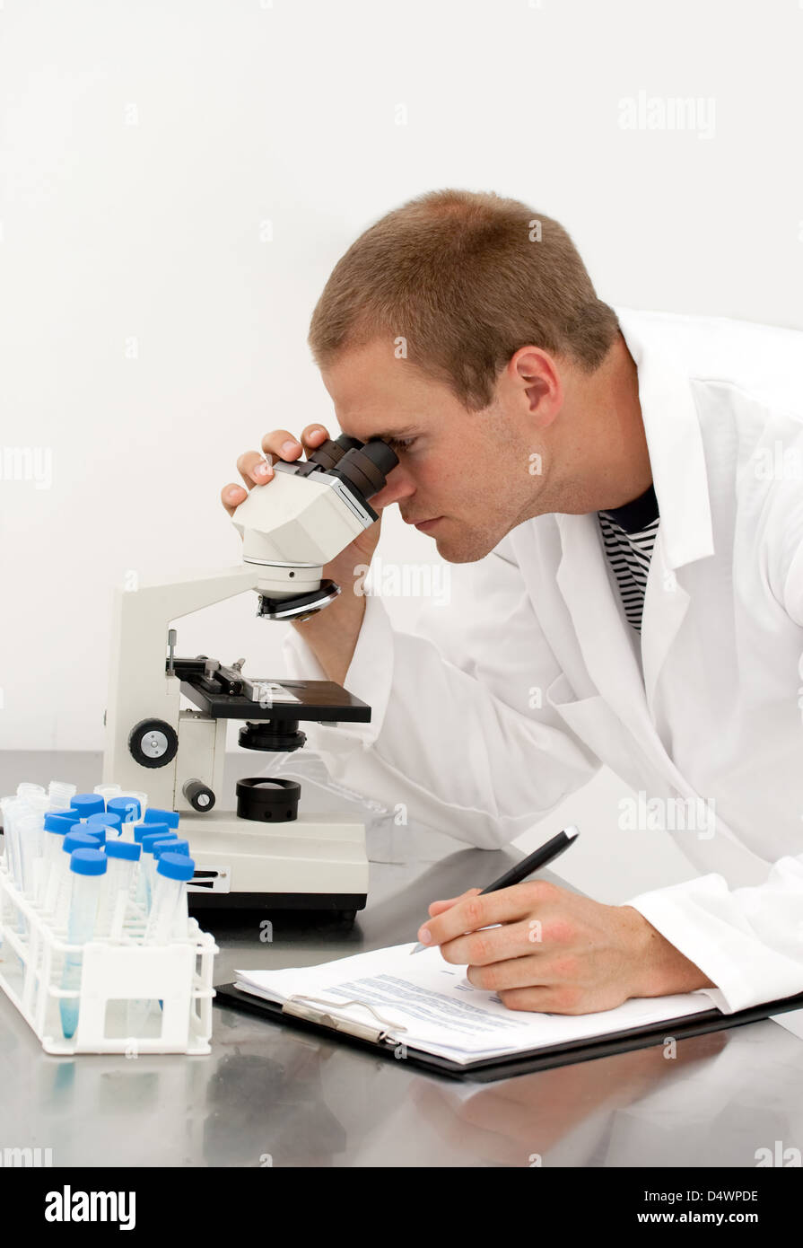 Technician men microscope natural hi-res stock photography and images ...