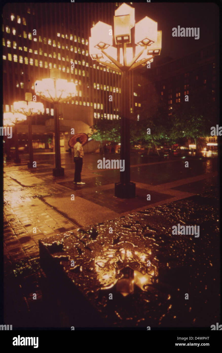 Photograph of Fountain Square in downtown Cincinnati on a rainy night ...