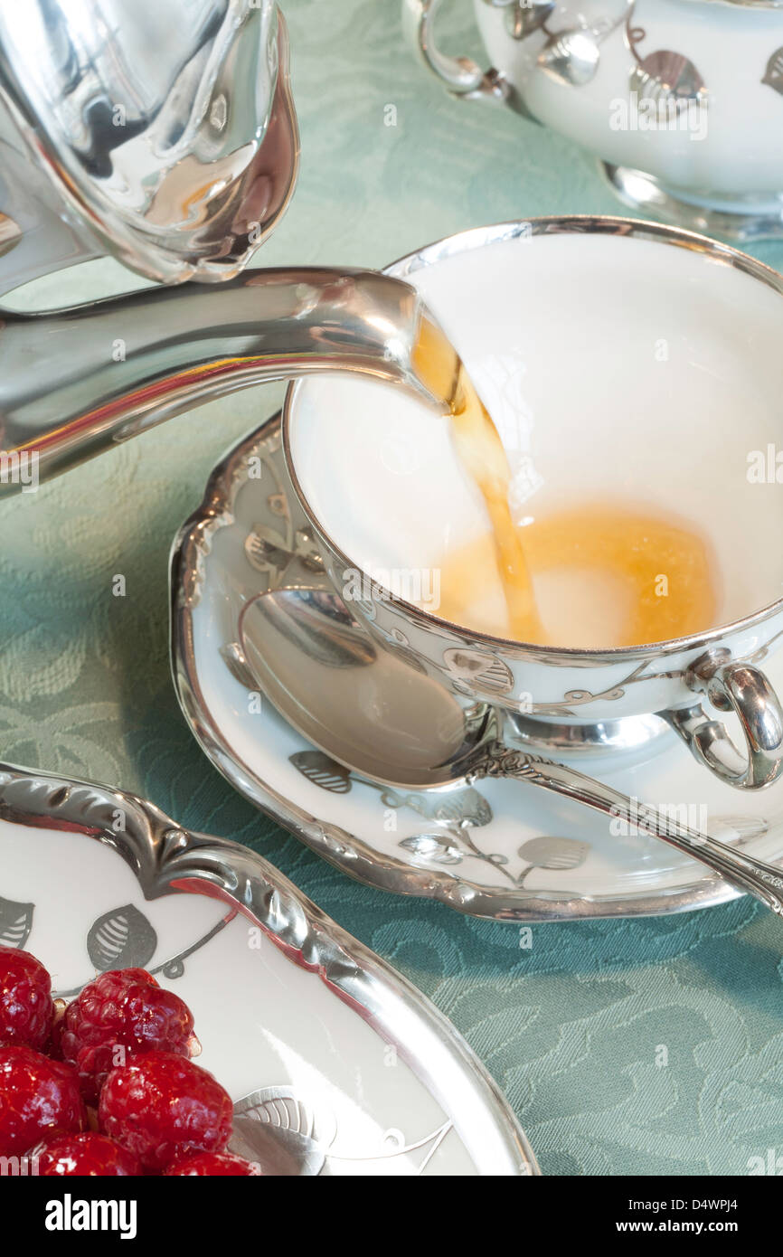 Pouring Tea [Series 2 of 3] Stock Photo - Alamy
