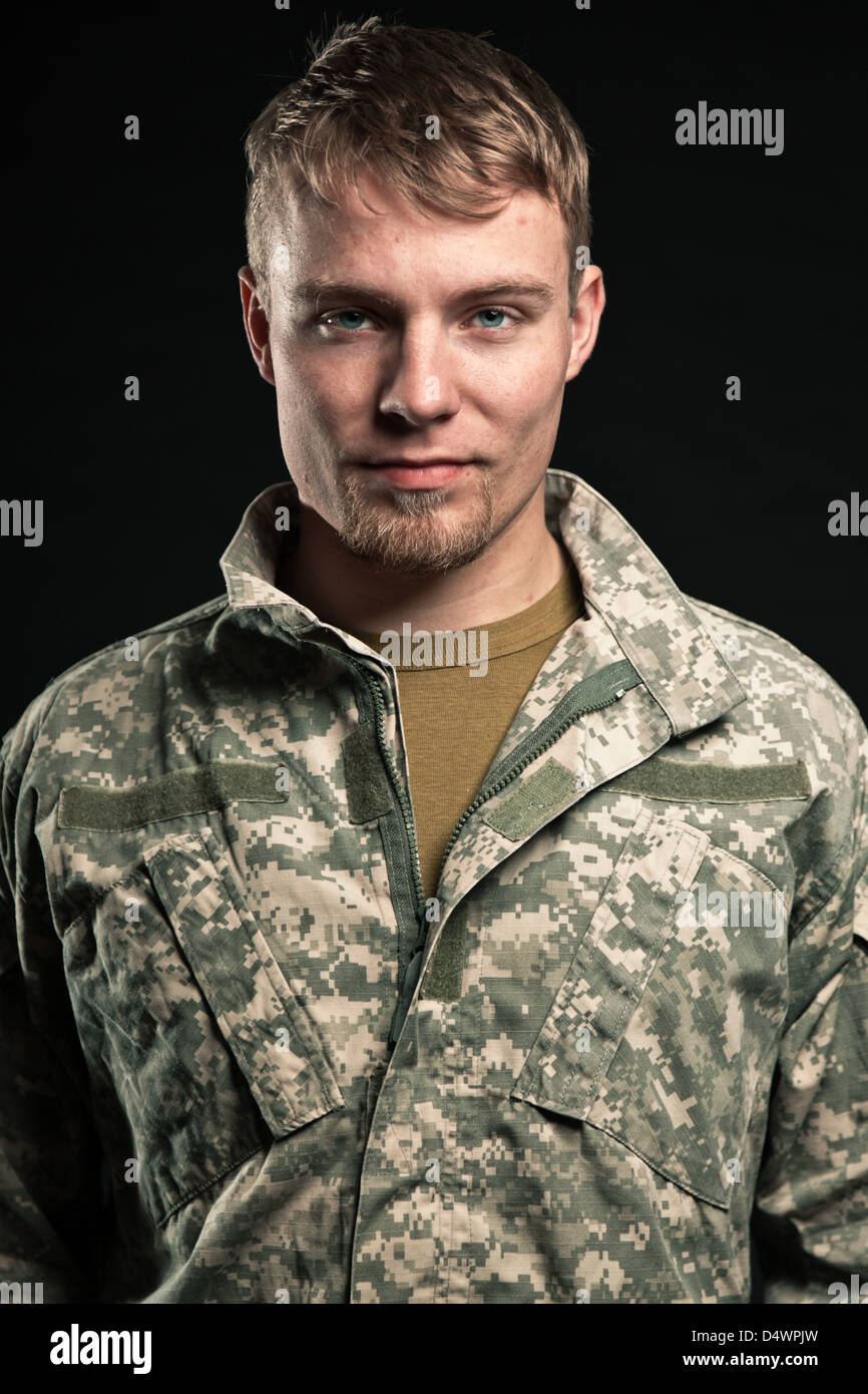 Military young man. Smiling. Studio portrait Stock Photo - Alamy