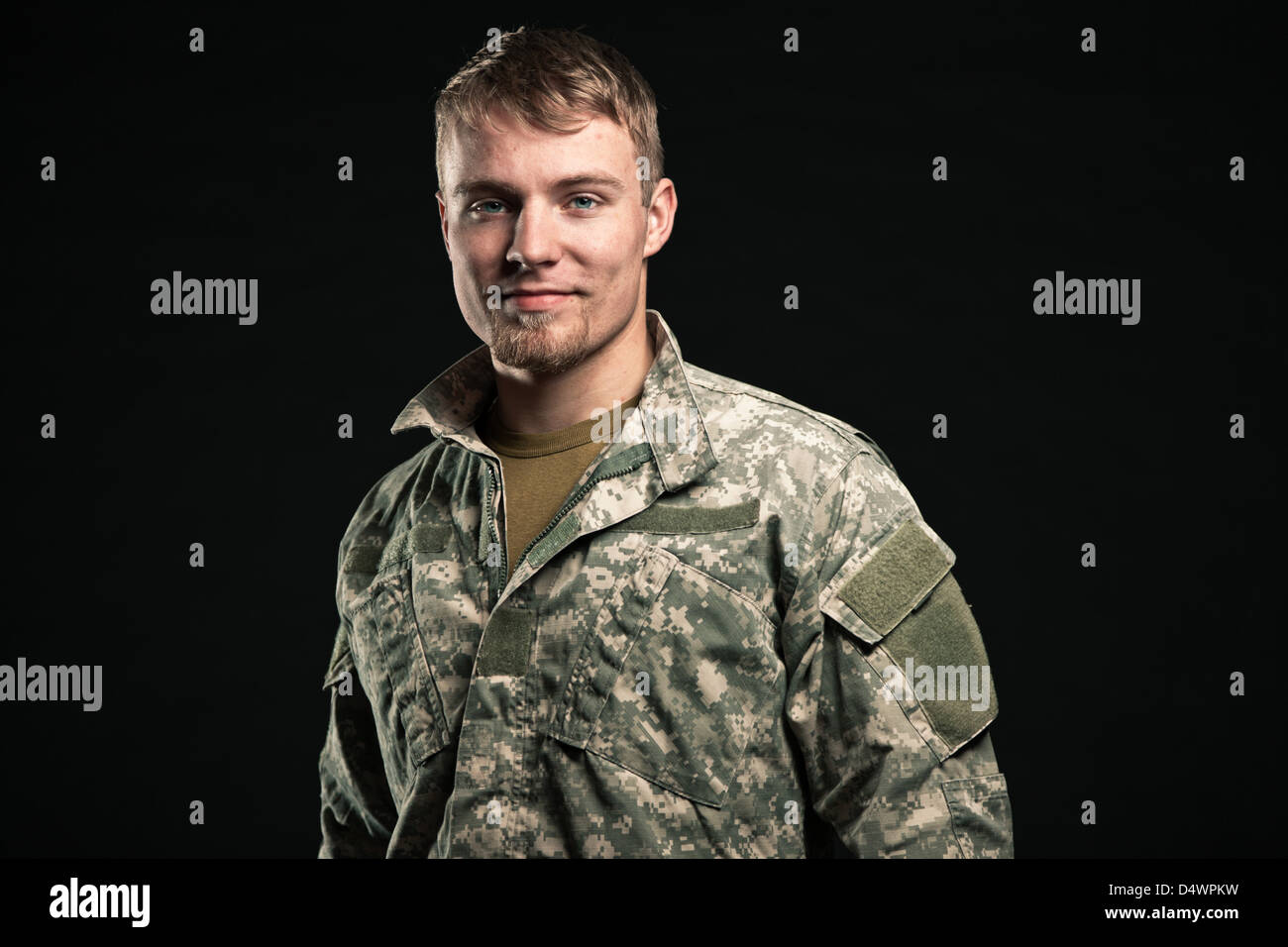 Military young man. Smiling. Studio portrait Stock Photo - Alamy