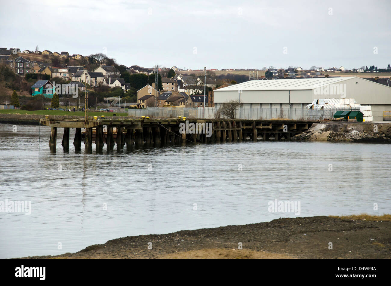 Old disused pier near Burntisland in Fife, Scotland. Ferries used to ...