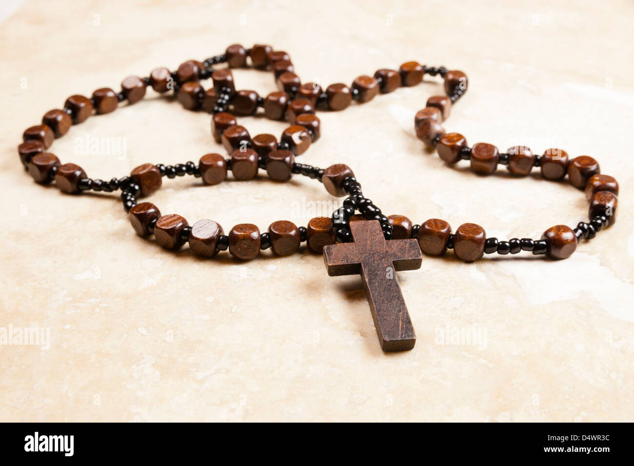 Rosary beads wooden cross hi-res stock photography and images - Alamy