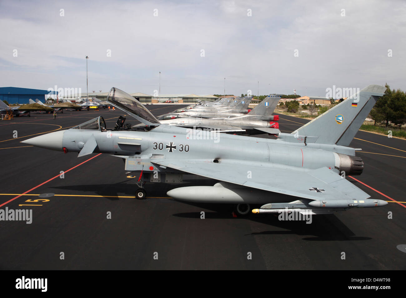 Military aircraft parked on the ramp at Albacete Airfield, Spain ...