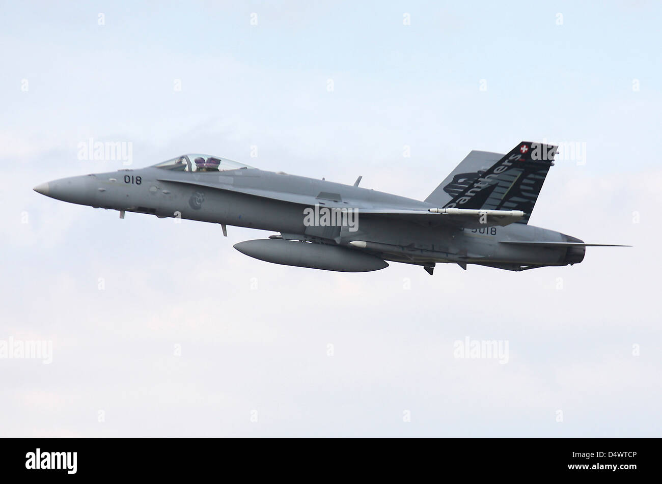 An F-18C Hornet of the Swiss Air Force armed with AIM-120 AMRAAM during ...