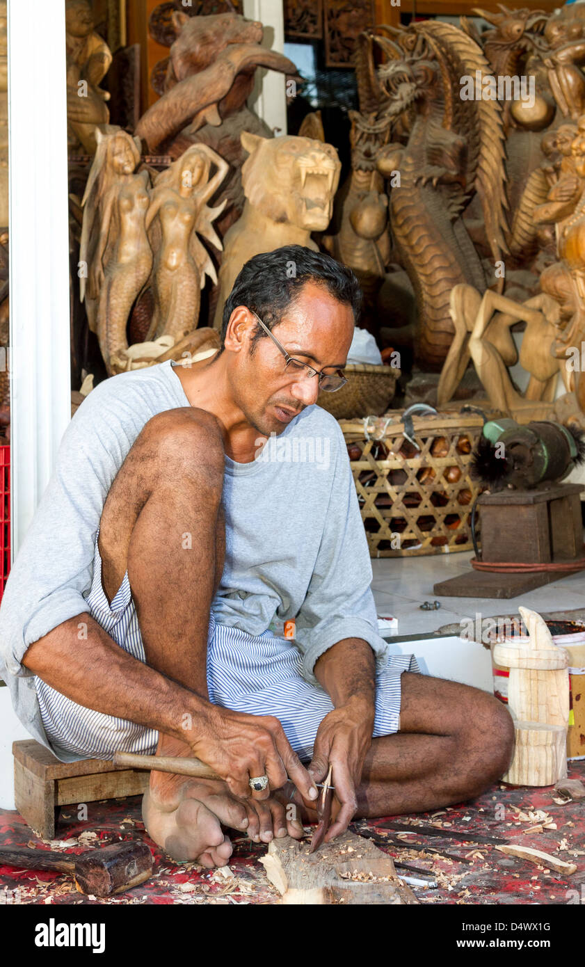 A man is making wooden crafts in Indonesia Stock Photo - Alamy