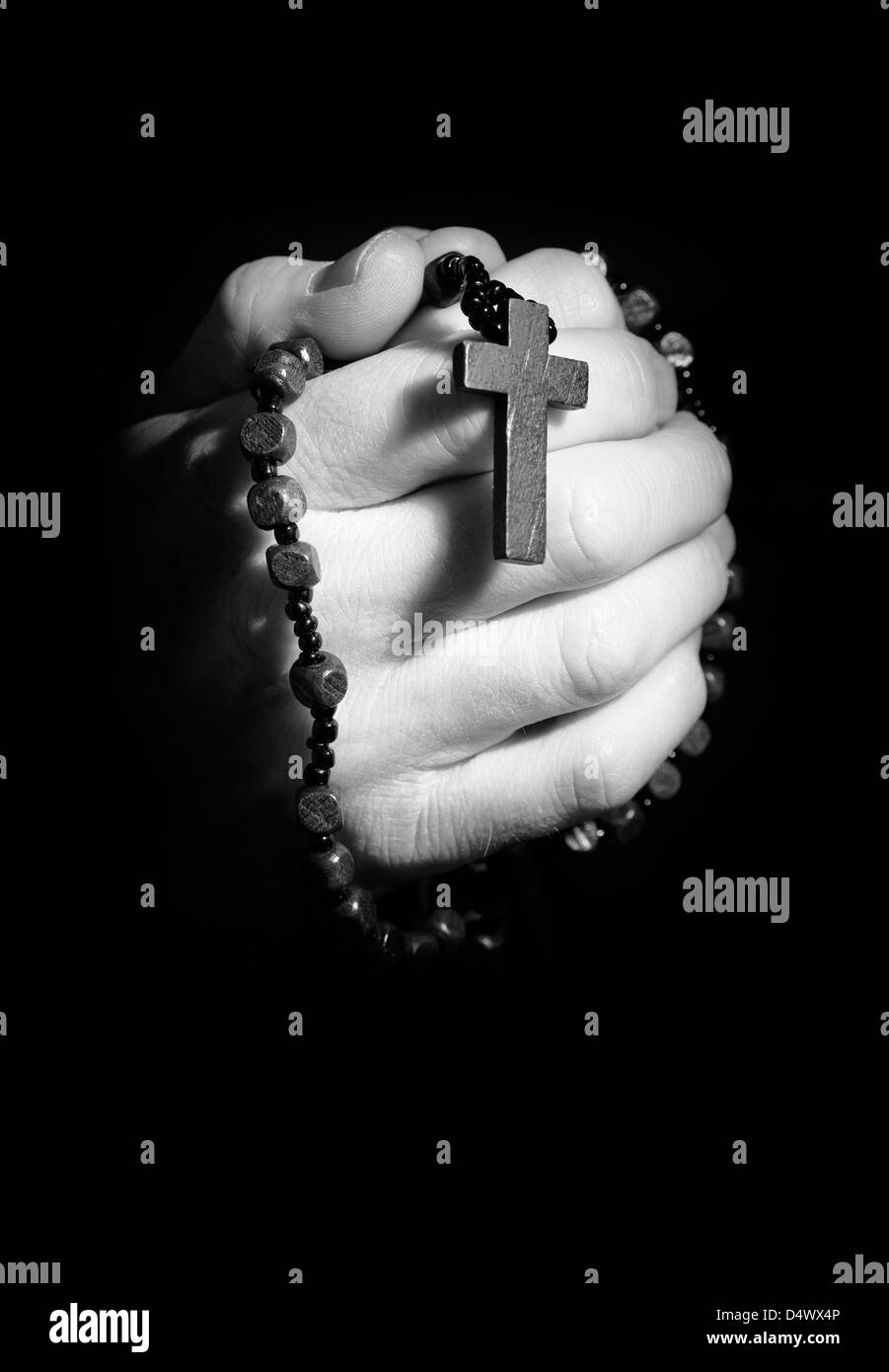 Catholic praying rosary Black and White Stock Photos & Images - Alamy