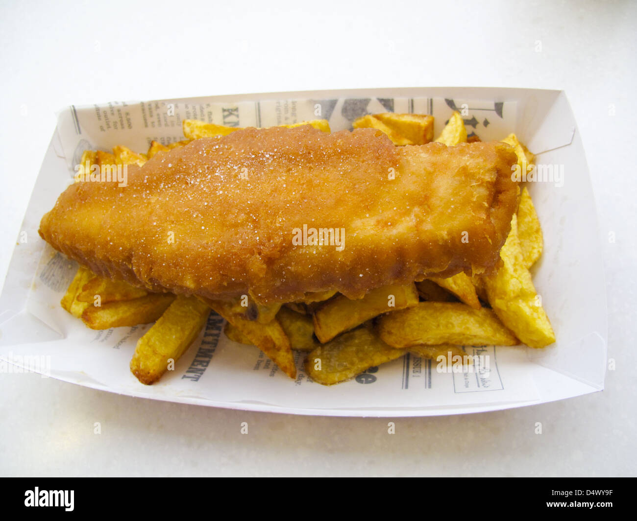 Fish and chips in cardboard dish Stock Photo - Alamy