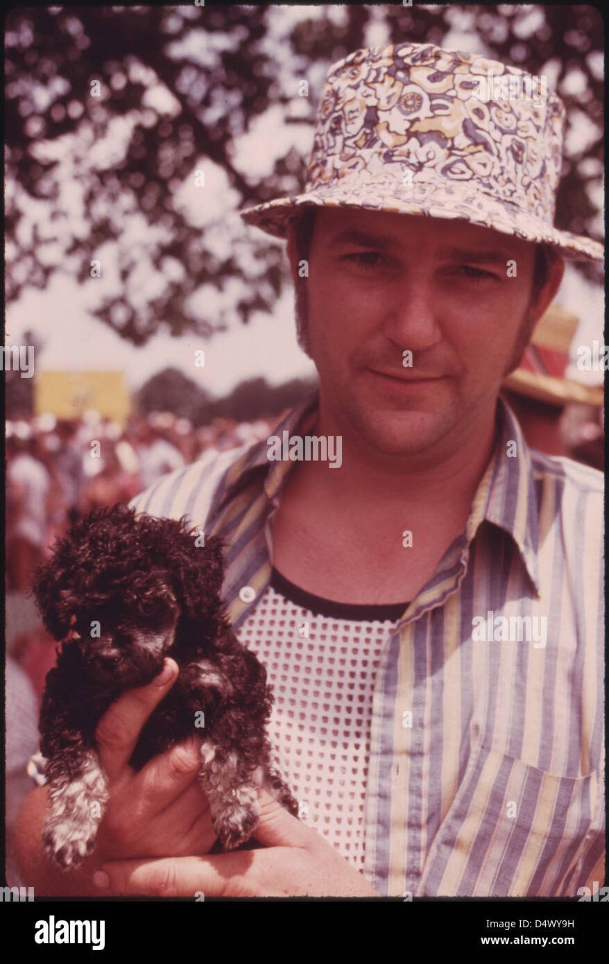 A photograph from August 1974 showing Doug McClain with his dog at the ...