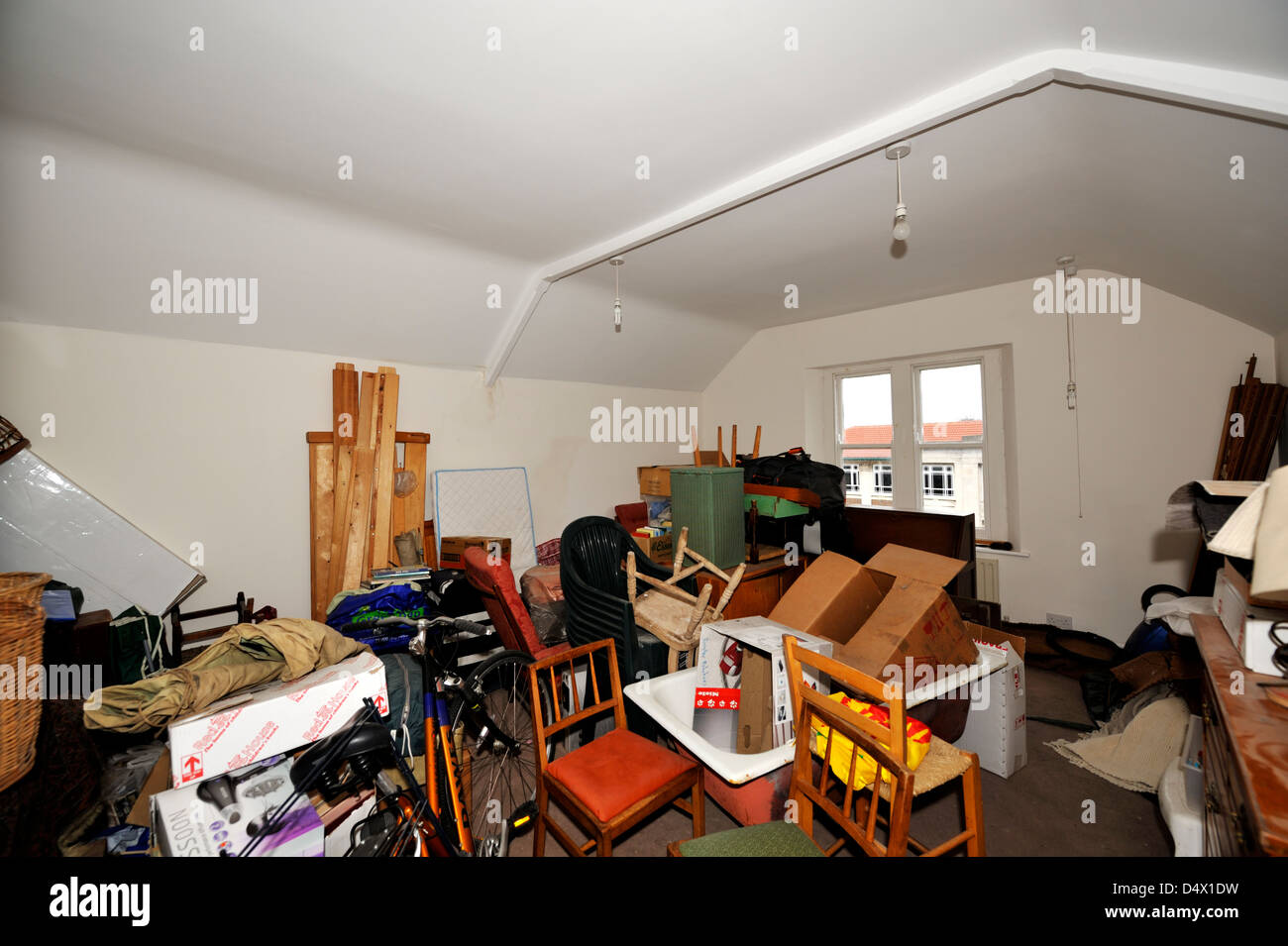 Room filled with clutter Stock Photo - Alamy